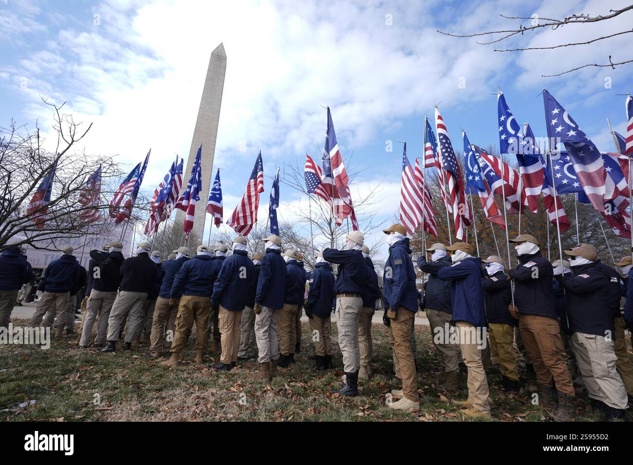 Members of a group calling themselves Patriot Front, some with upside ...