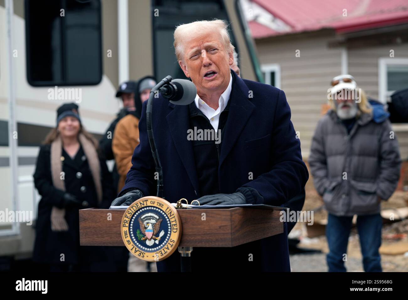 President Donald Trump speaks as he meets with homeowners affected by ...