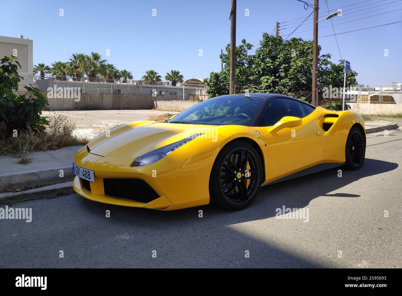 Larnaca, Cyprus - May 16 2024: Yellow Ferrari 488 GTB coupe sports car ...