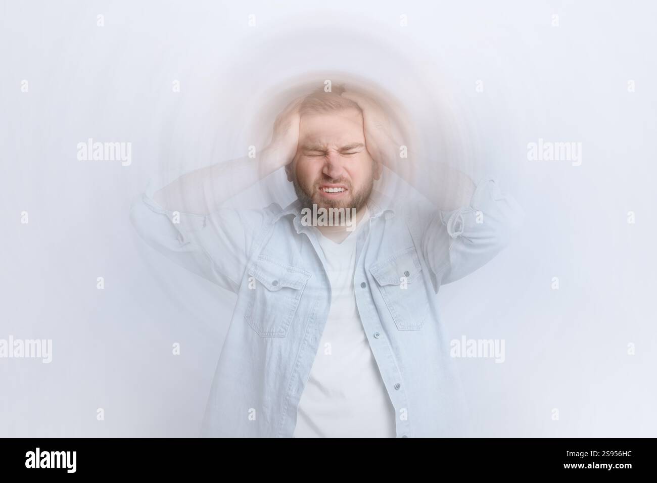 Man suffering from headache and dizziness on white background Stock ...