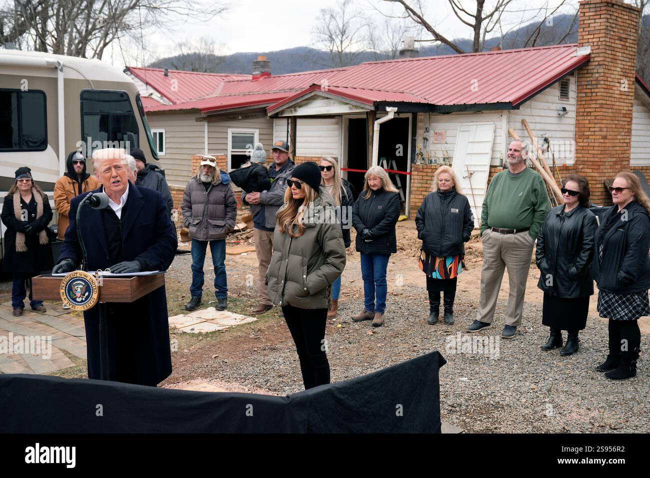 President Donald Trump speaks along side first lady Melania Trump, as ...