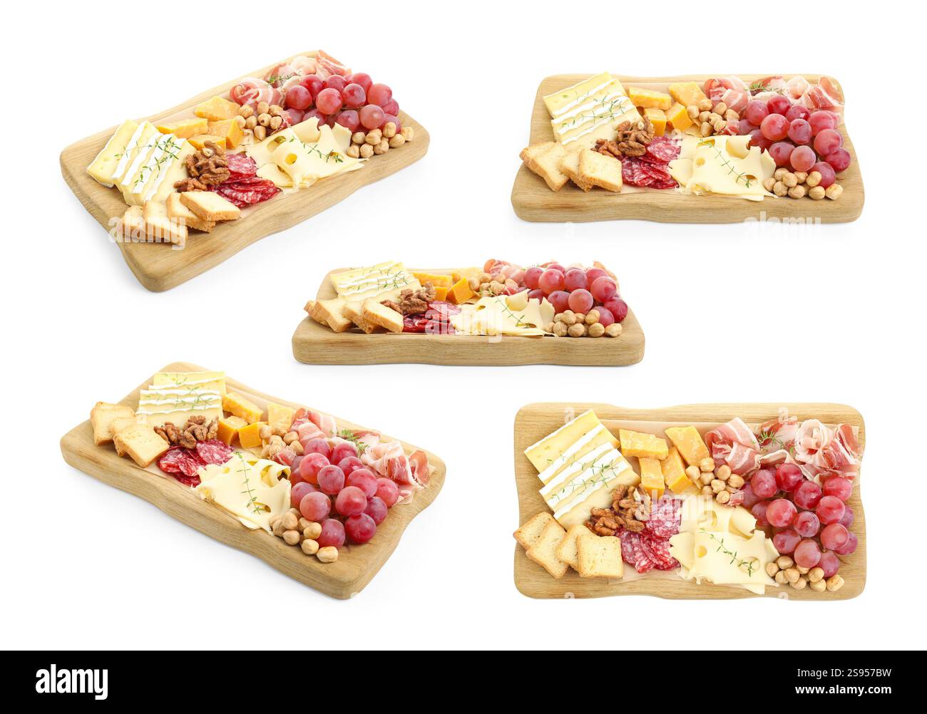 Different types of cut cheese and other snacks isolated on white ...