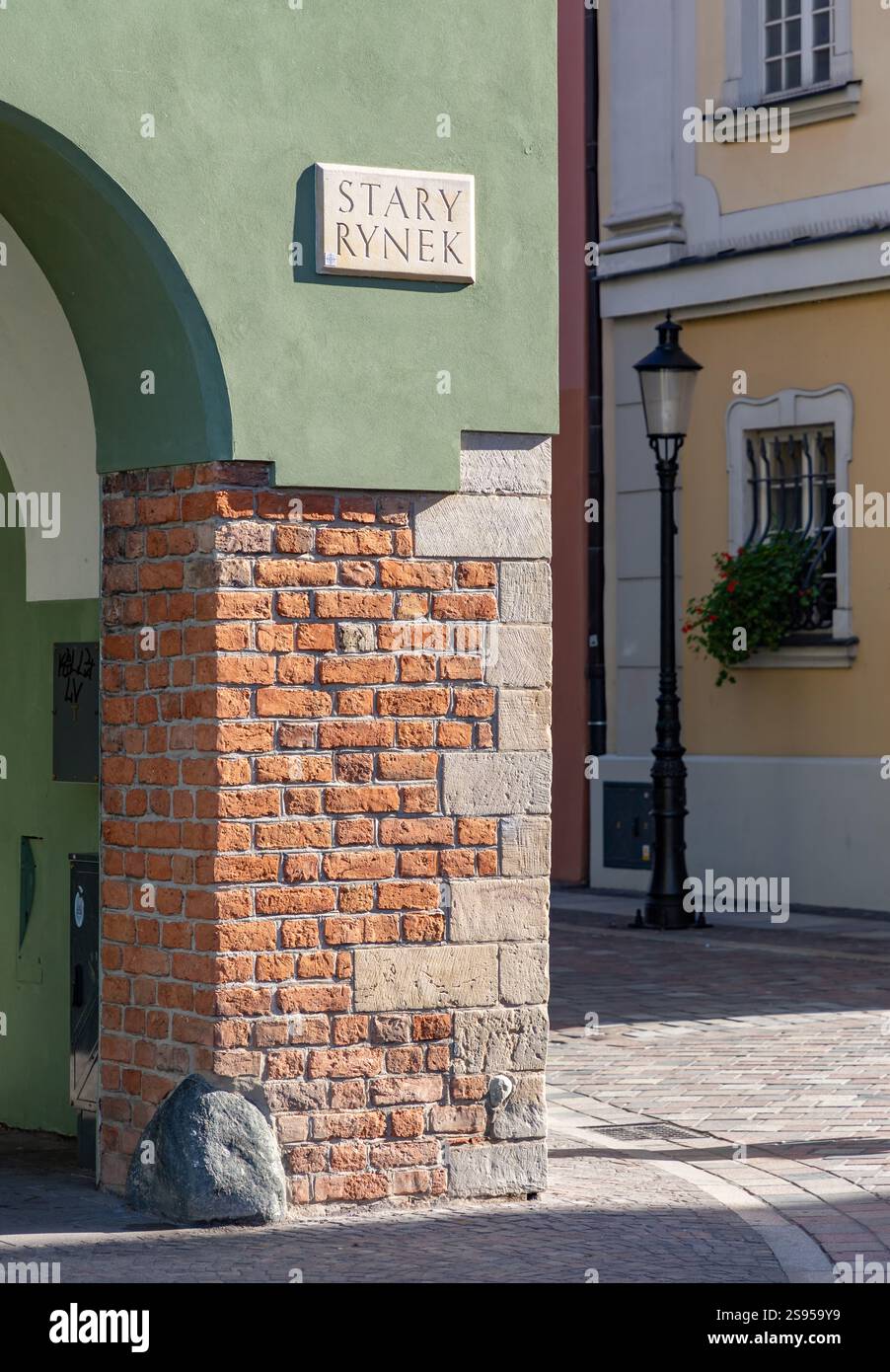 A picture of the Poznan Old Market Square sign on a facade Stock Photo ...