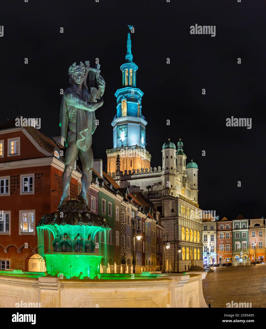 A picture of the Poznan Old Market Square at night, with the Town Hall ...