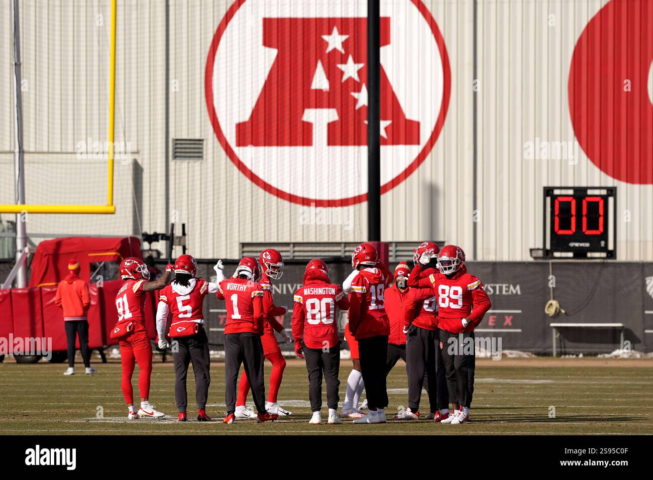 Kansas City Chiefs players huddle during the team's NFL football ...