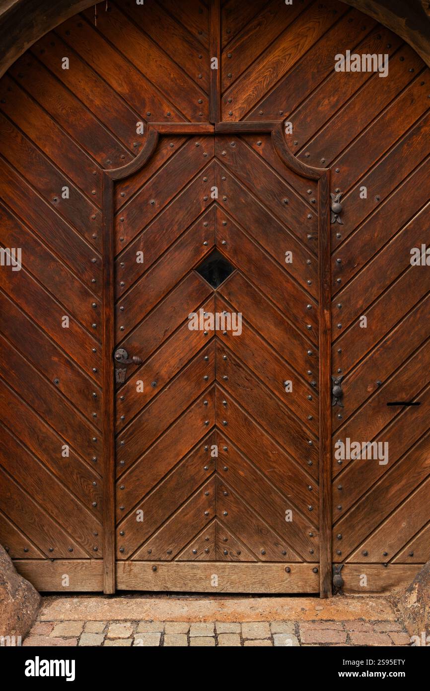 Engraved wooden doors of an old classic door. Antique wooden textures ...