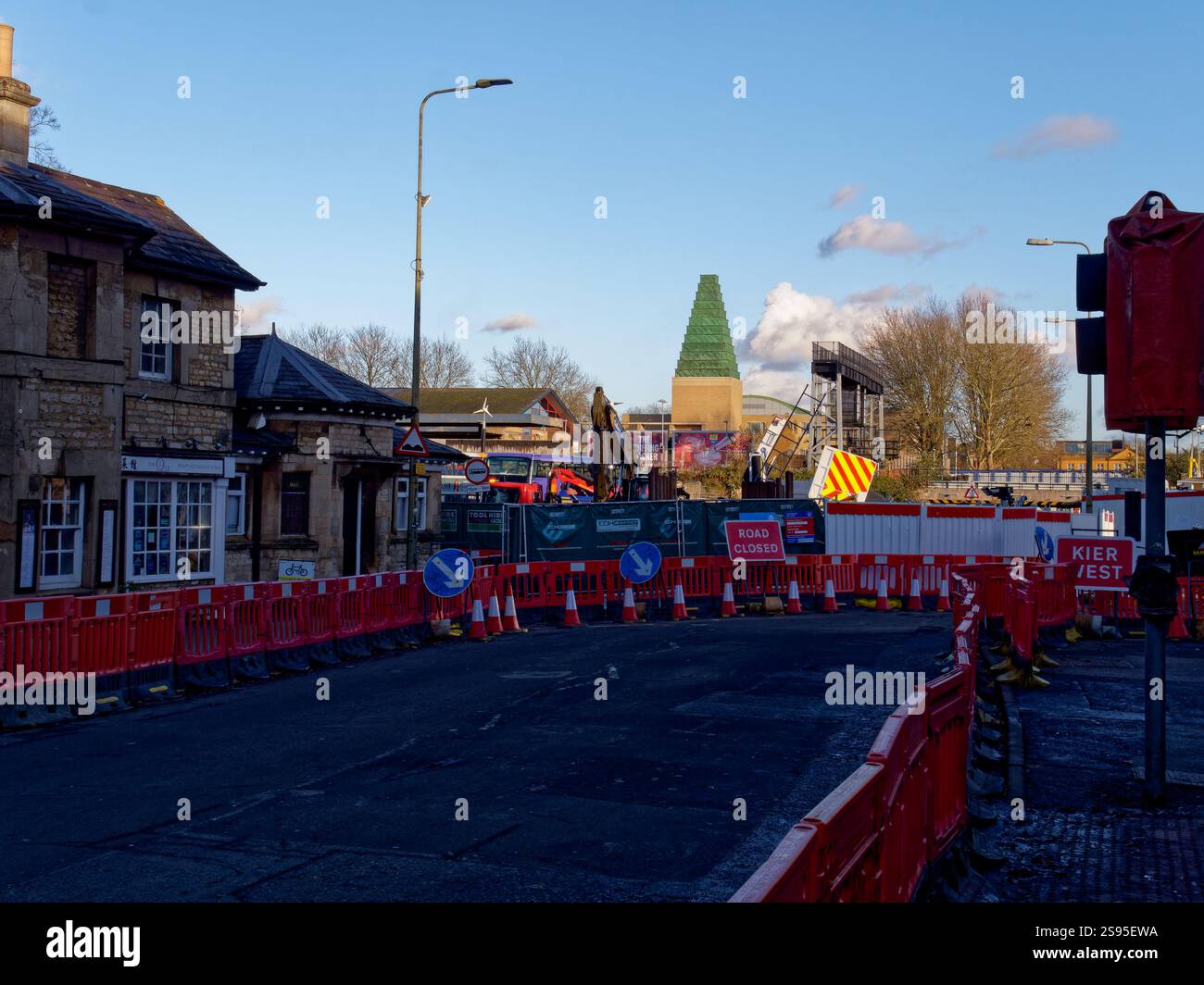 Roadworks on Botley Road with signs, barriers and the Saïd Business ...