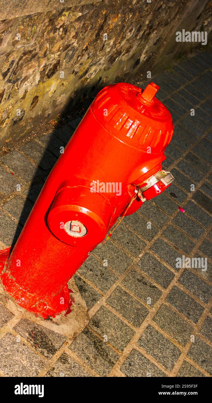 Front view, medium distance of a red fire water hydrant Stock Photo - Alamy