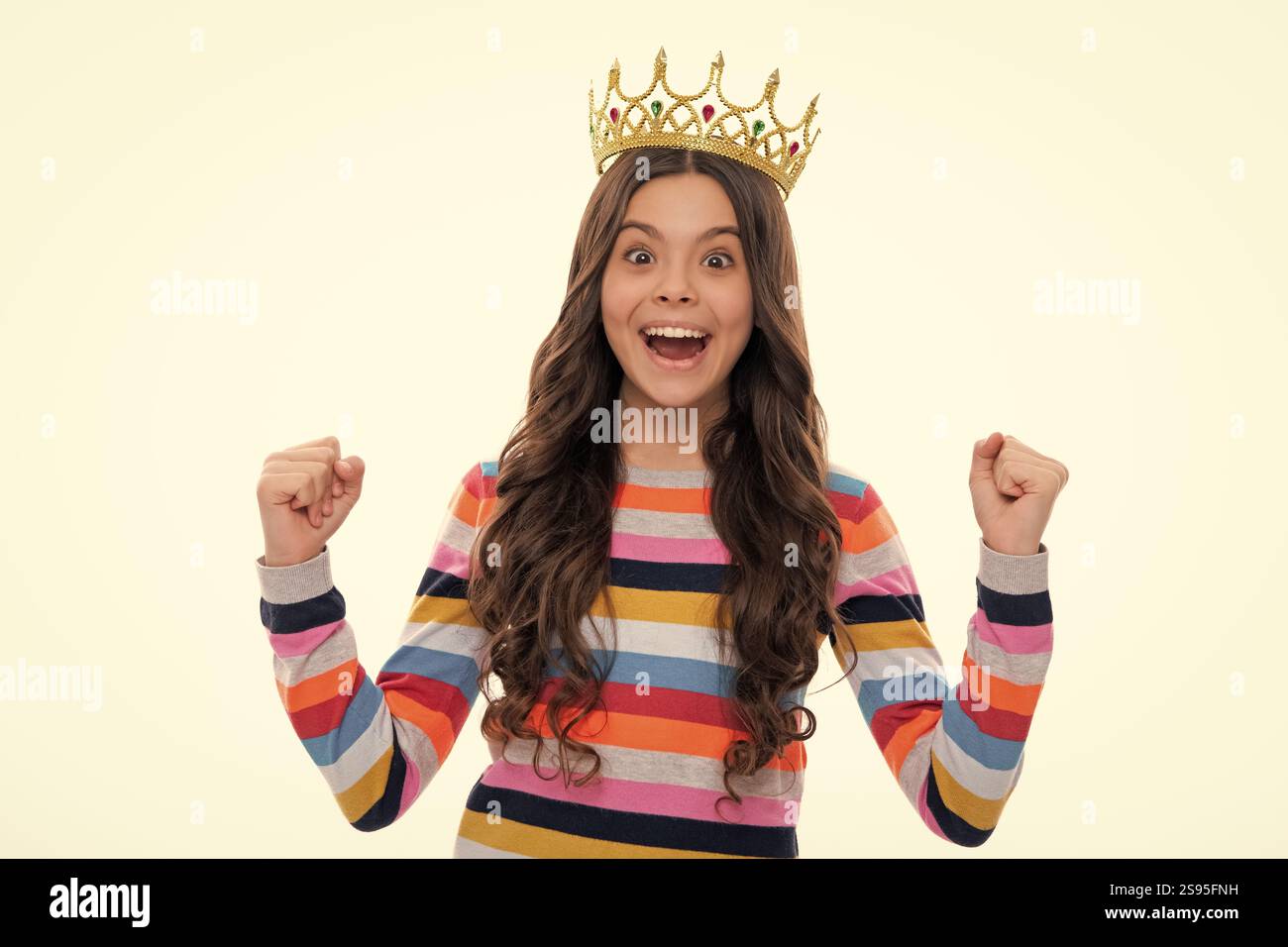 Portrait of ambitious teenage girl with crown, feeling princess ...
