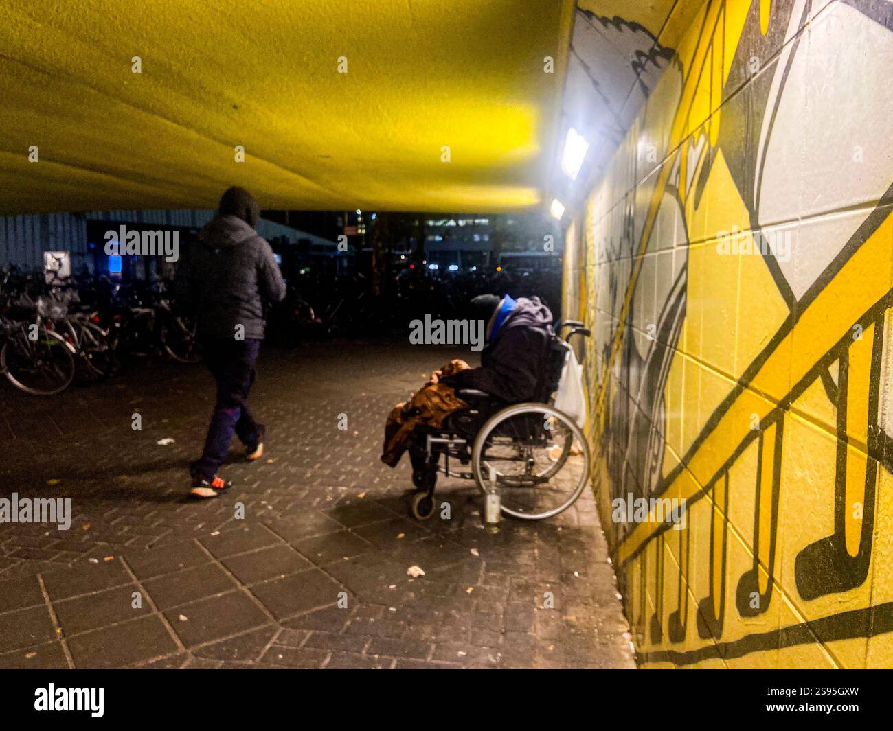 Homeles Person sitting in his Wheelchair totally being Ignored by ...