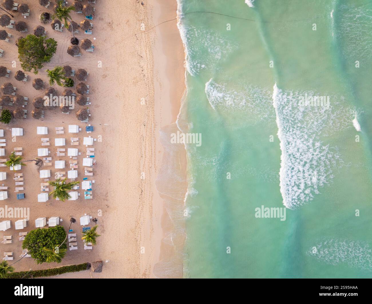 Birds eye view of a wonderful sandy beach,parasol,beach chair and ...
