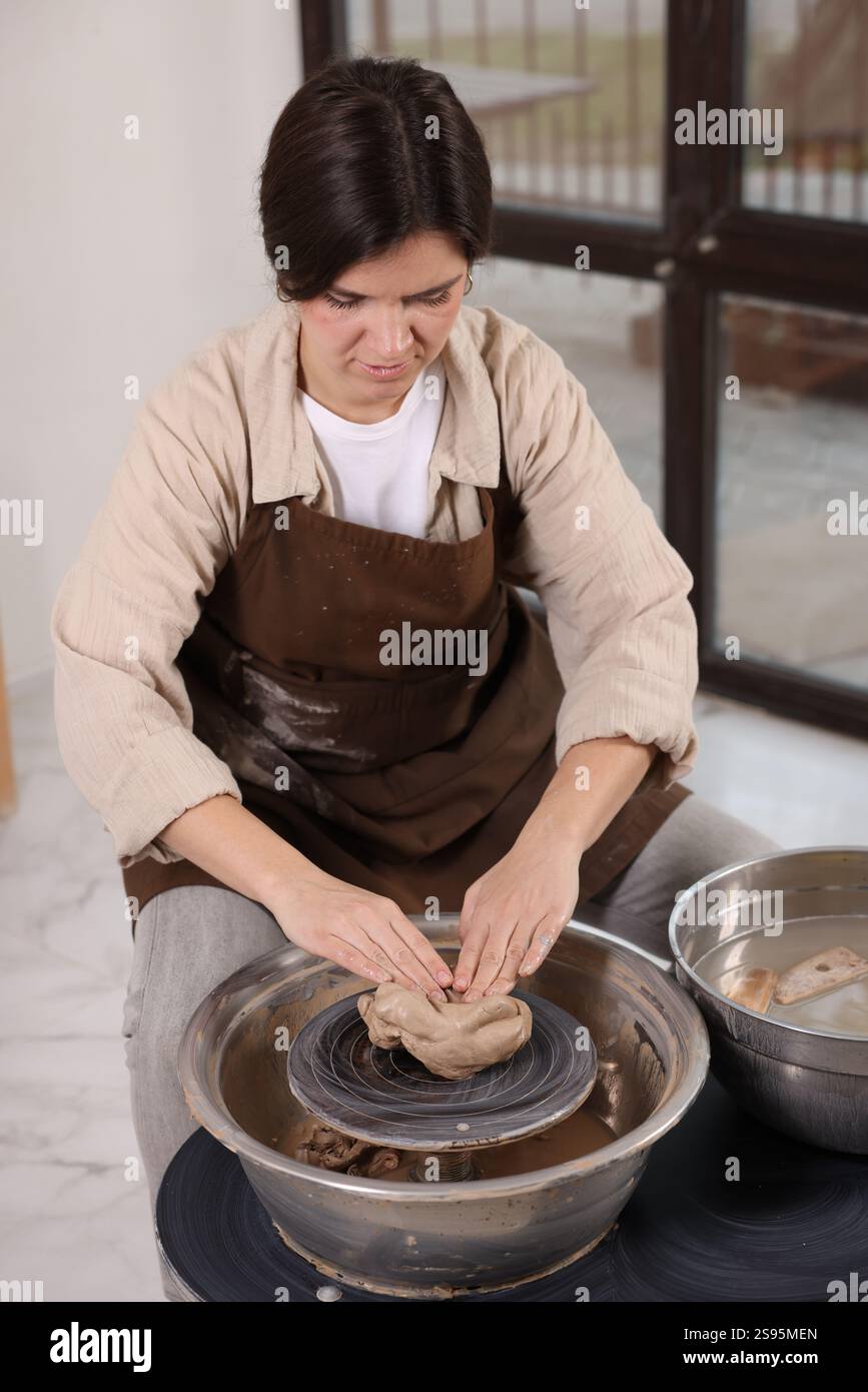 Hobby and craft. Woman making pottery indoors Stock Photo - Alamy