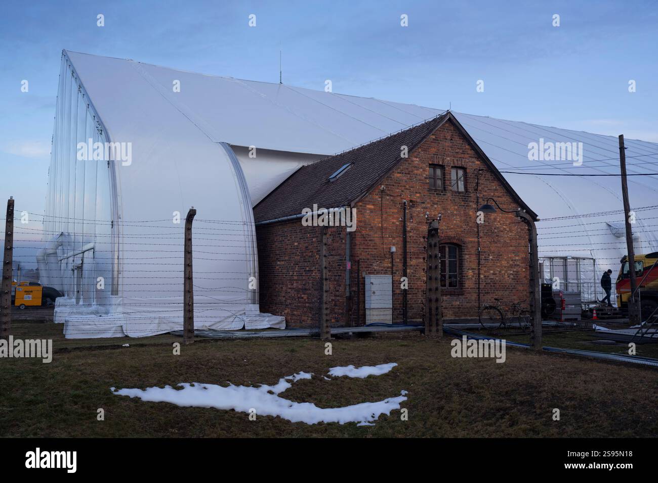 A large tent covers the main entrance to the former Nazi German ...