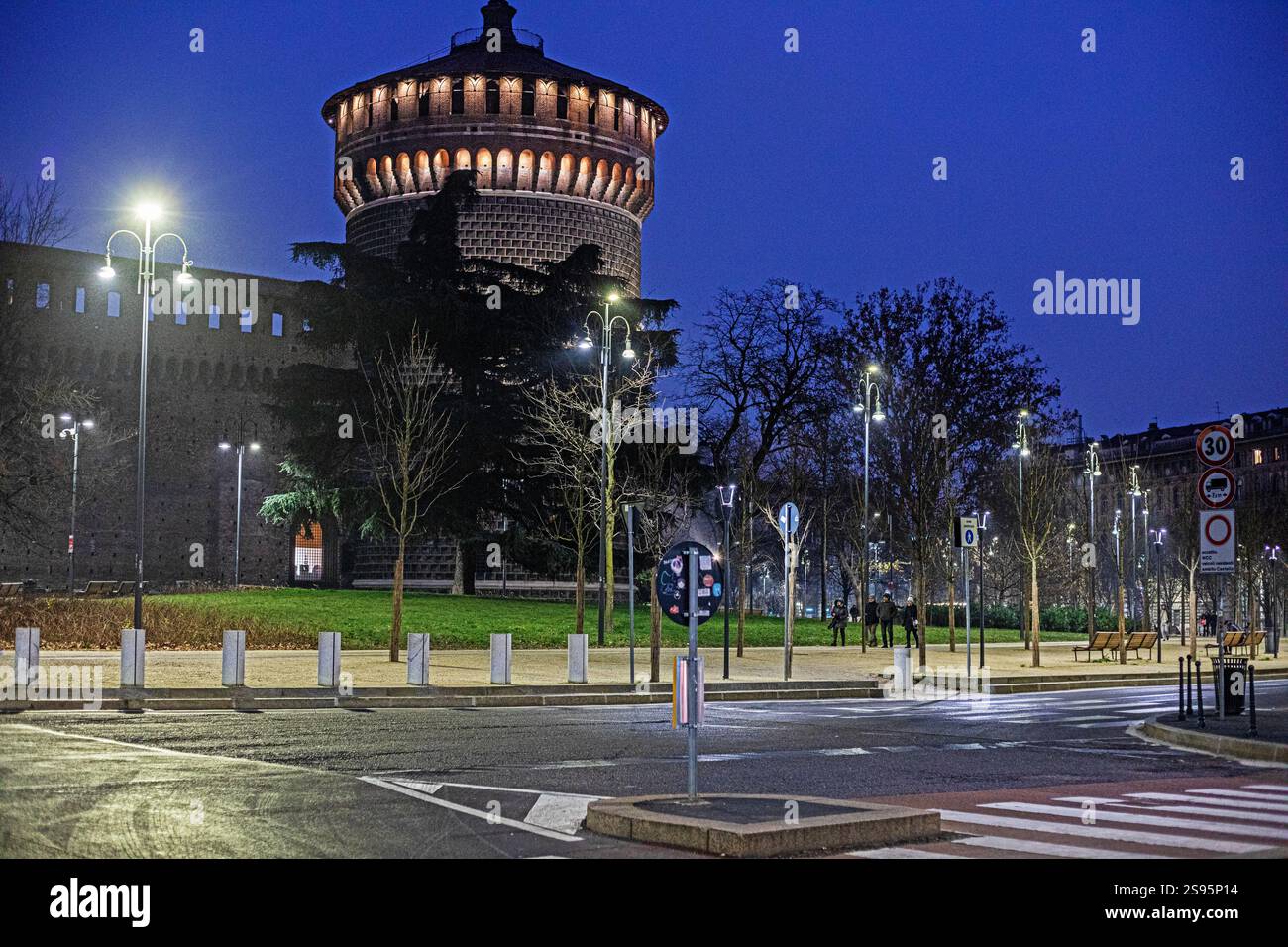 ancient Gothic castle illuminated in the evening. Traveling around ...