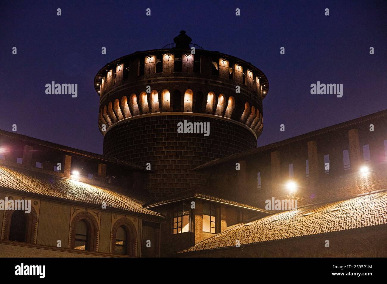 ancient Gothic castle illuminated in the evening. Traveling around ...