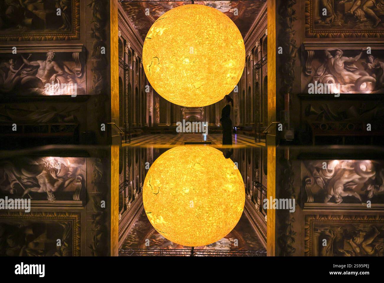 London, UK, 24th Jan 2025. Staff with the installation. The new 'Helios ...