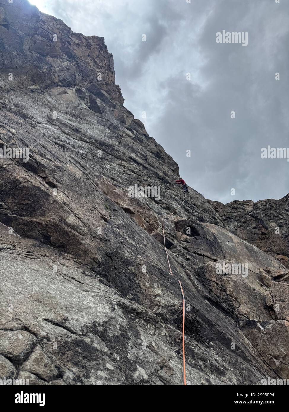 Unidentified climber climbing up a sport rock climbing route in El ...