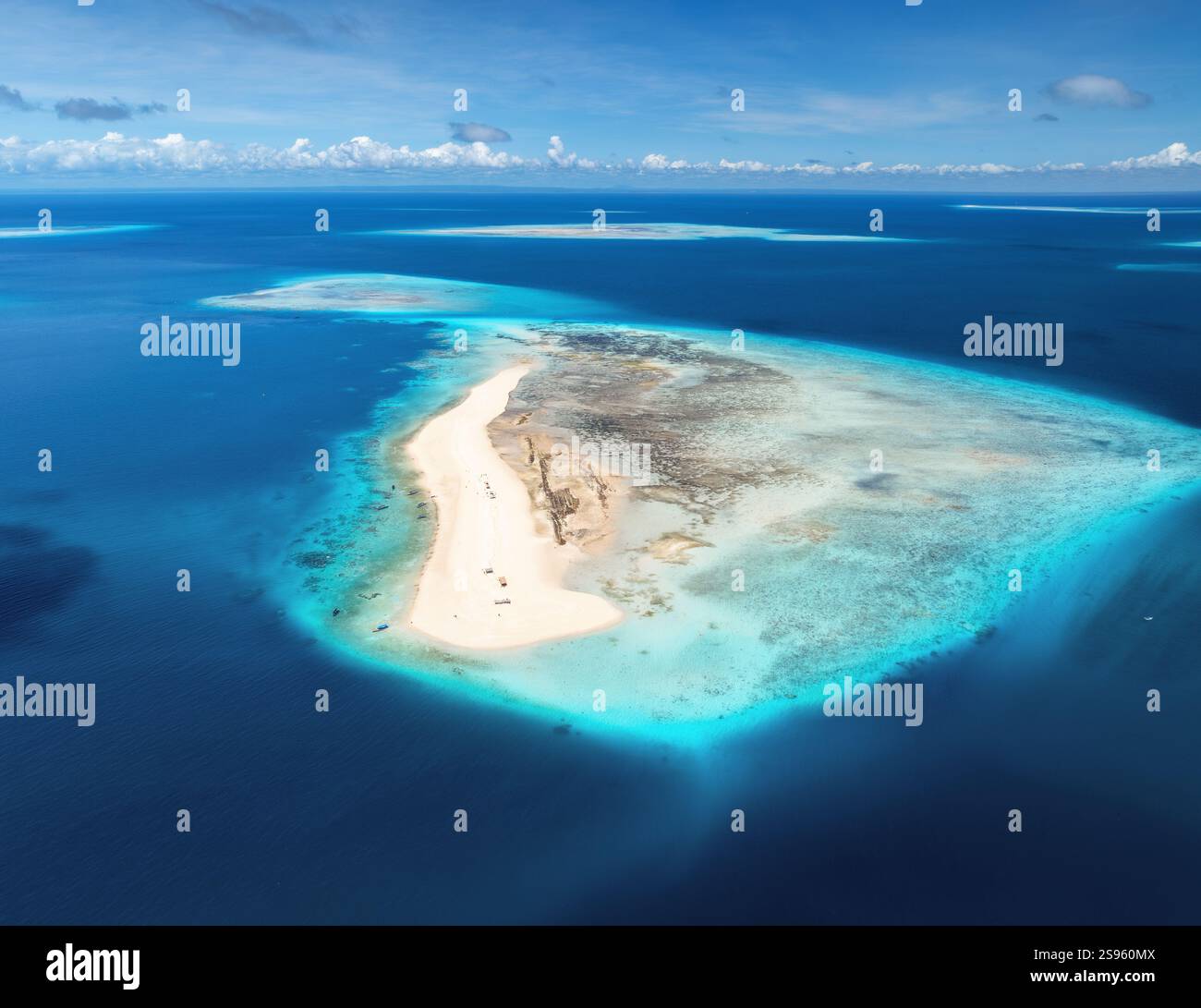 Aerial view of island, sandbank in blue sea, white sand, boats Stock ...