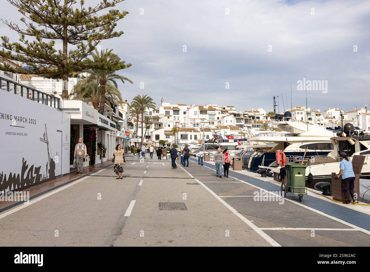 Boulevard of luxury yacht harbour port with boats and port village in ...