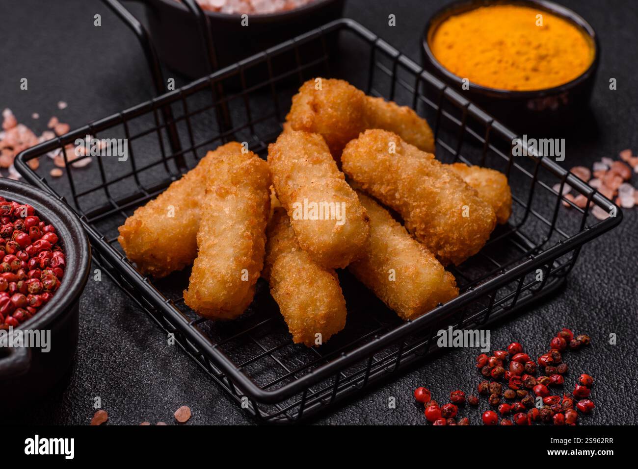 Delicious crispy cheese sticks with mozzarella, salt and spices ...
