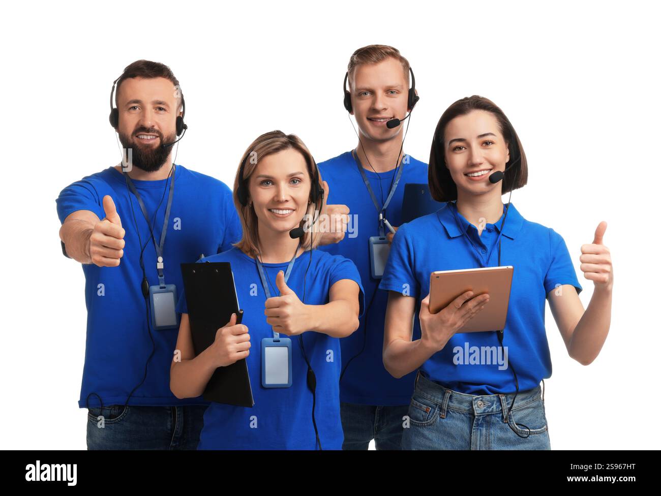 Technical support call center. Team of friendly operators showing ...