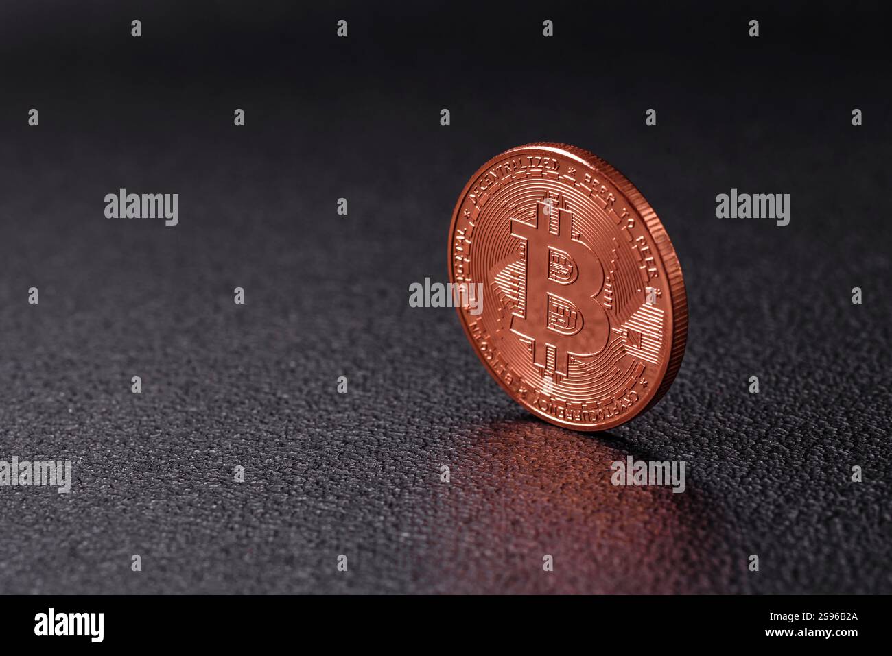 Bitcoin cryptocurrency dummy in the form of a round iron coin ...