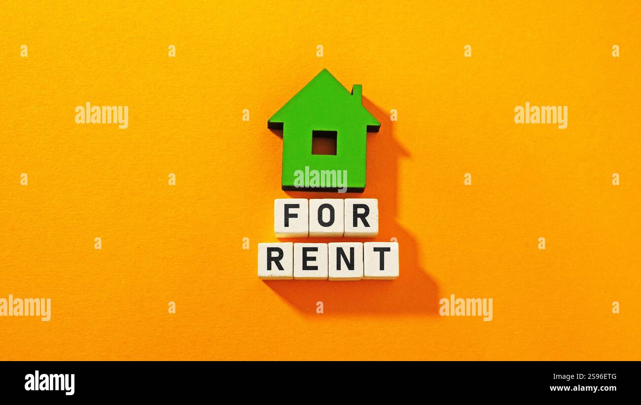 House model and for rent sign. Real estate leasing Stock Photo - Alamy