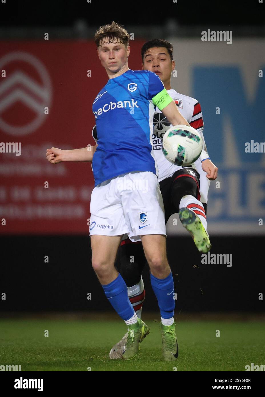 Genk's Thomas Claes and Rwdm's David Sousa fight for the ball during a ...