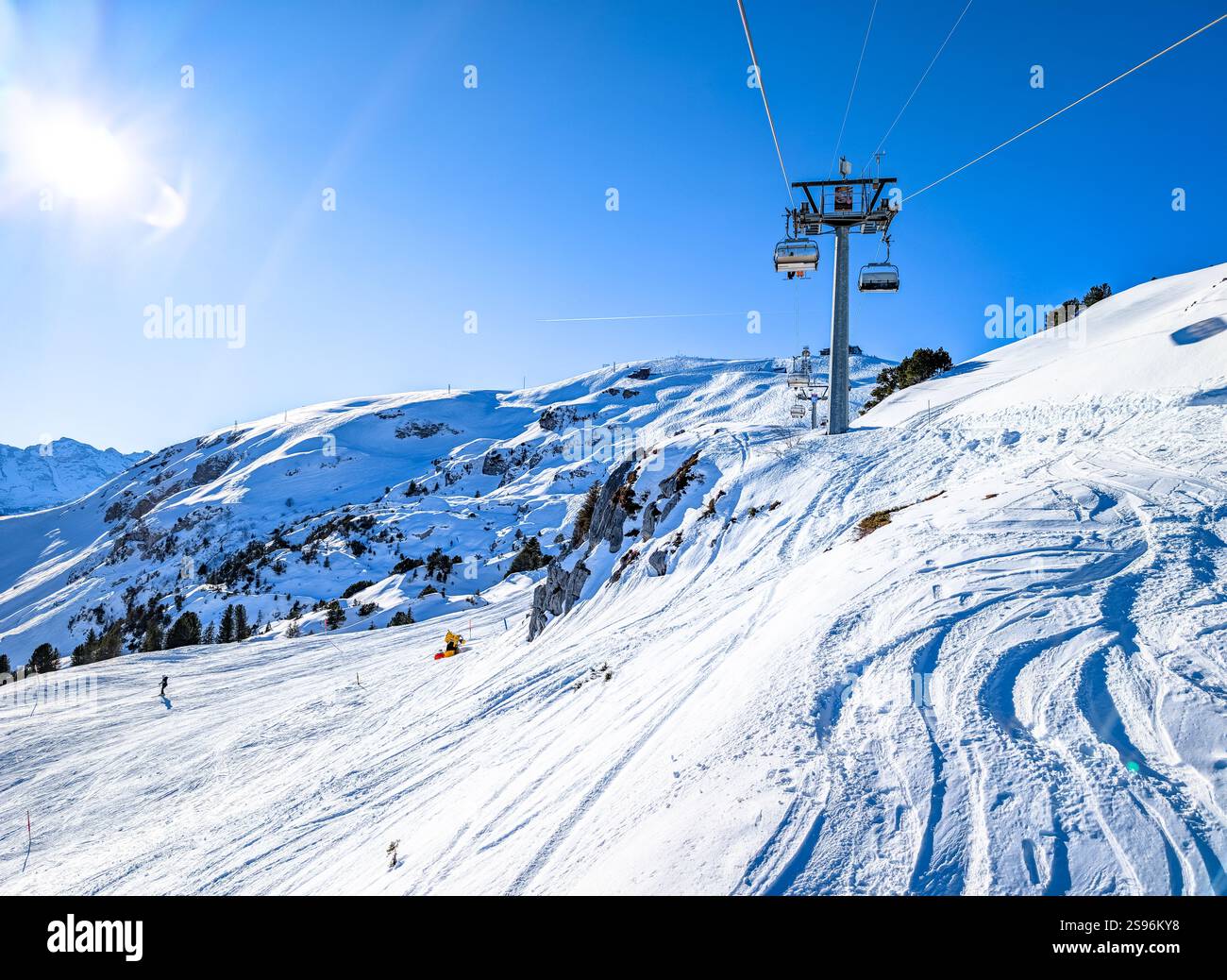 Aerial drone view of snow covered mountains and ski slopes, ski area ...