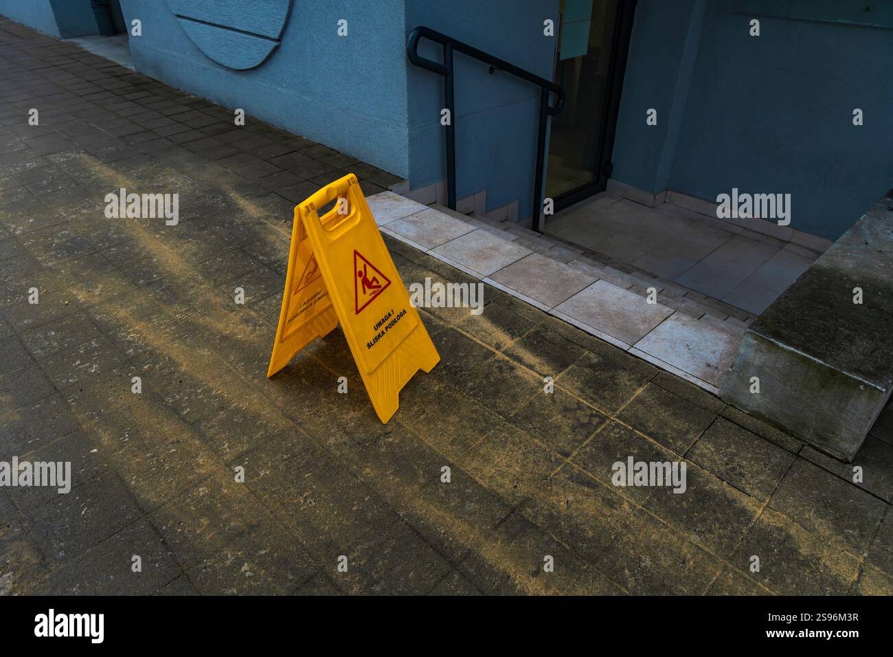 Beware, ice on the sidewalk, beware, slippery, wet stairs, yellow ...