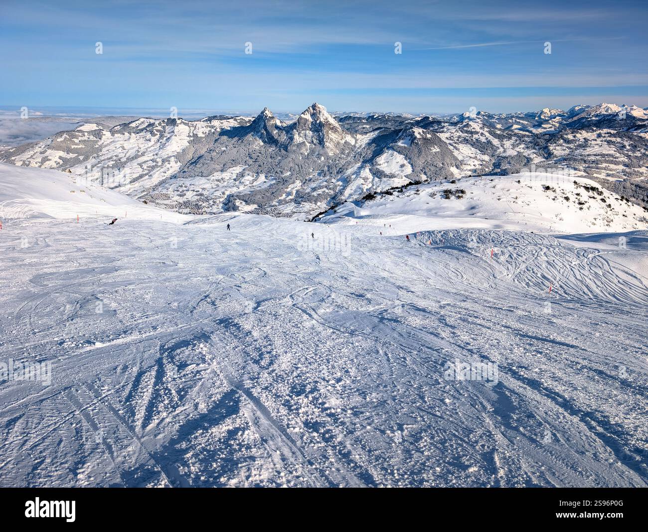 Aerial drone view of snow covered mountains and ski slopes, ski area ...