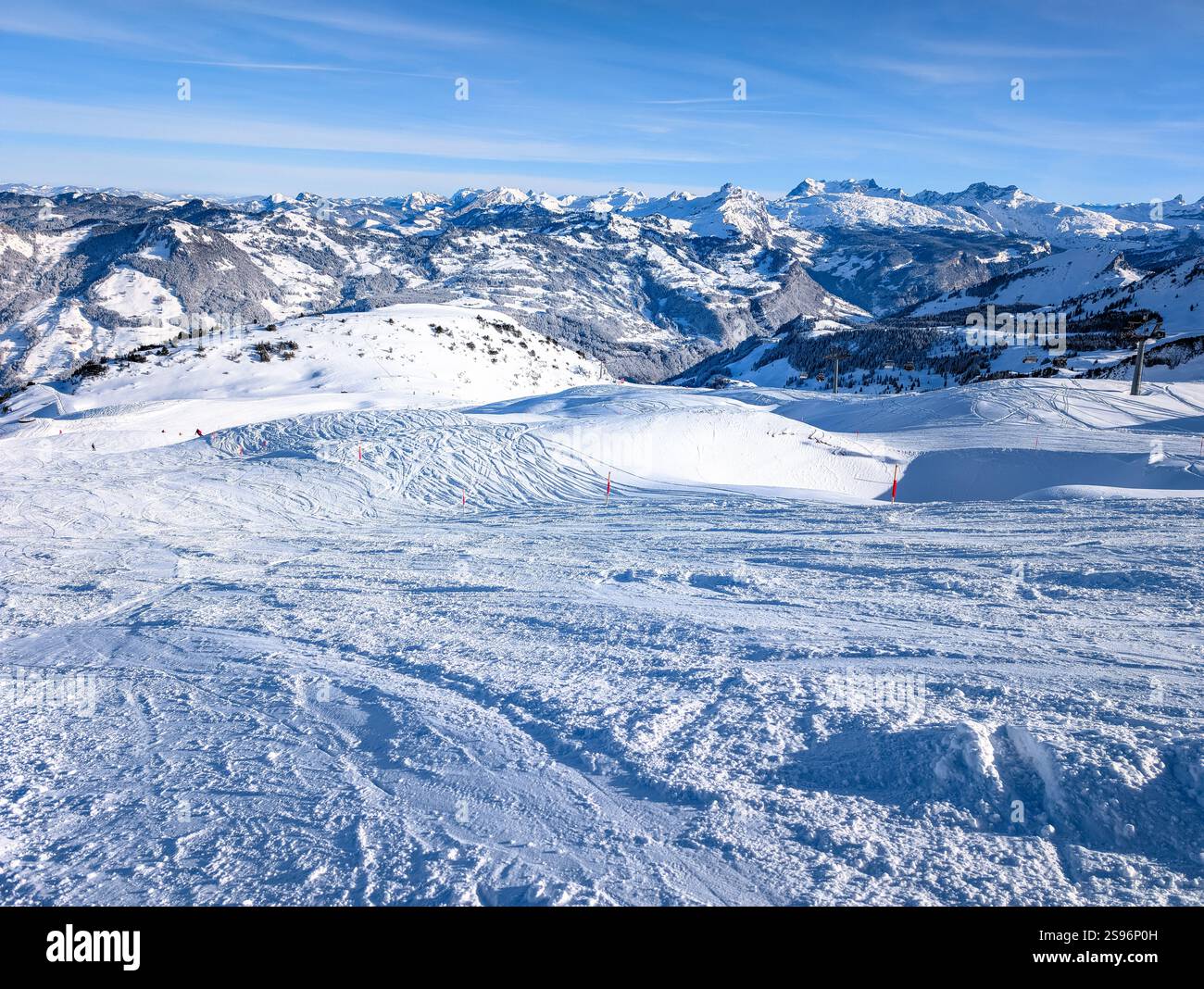 Aerial drone view of snow covered mountains and ski slopes, ski area ...