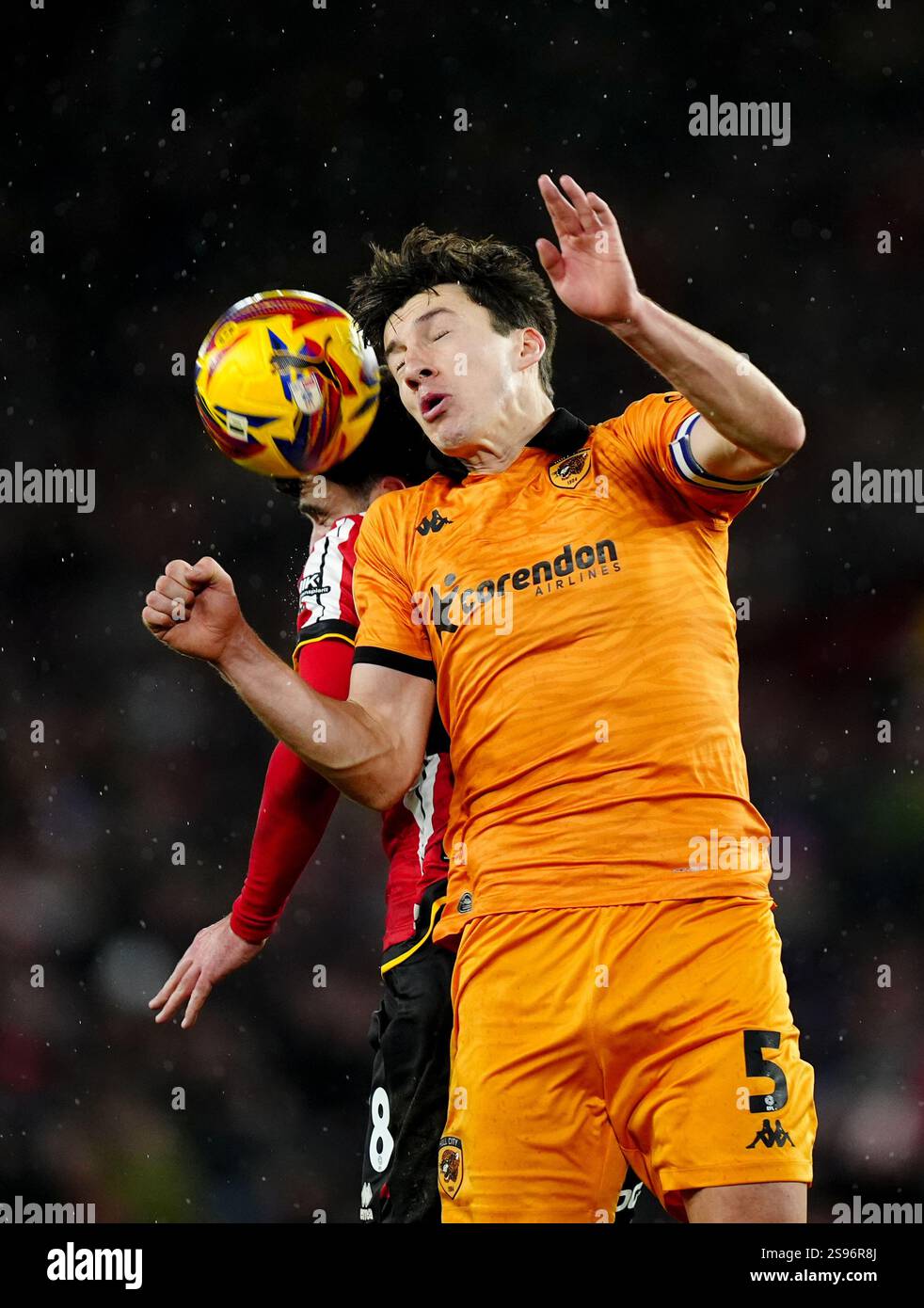 Hull City's Alfie Jones (right) and Sheffield United's Thomas Cannon ...