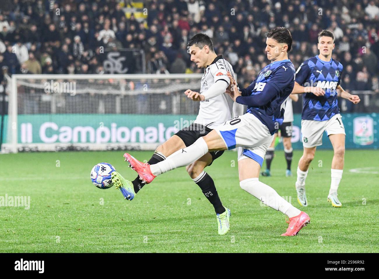 Luca Vignali (Spezia) fights for the ball against Tarik Muharemovic ...