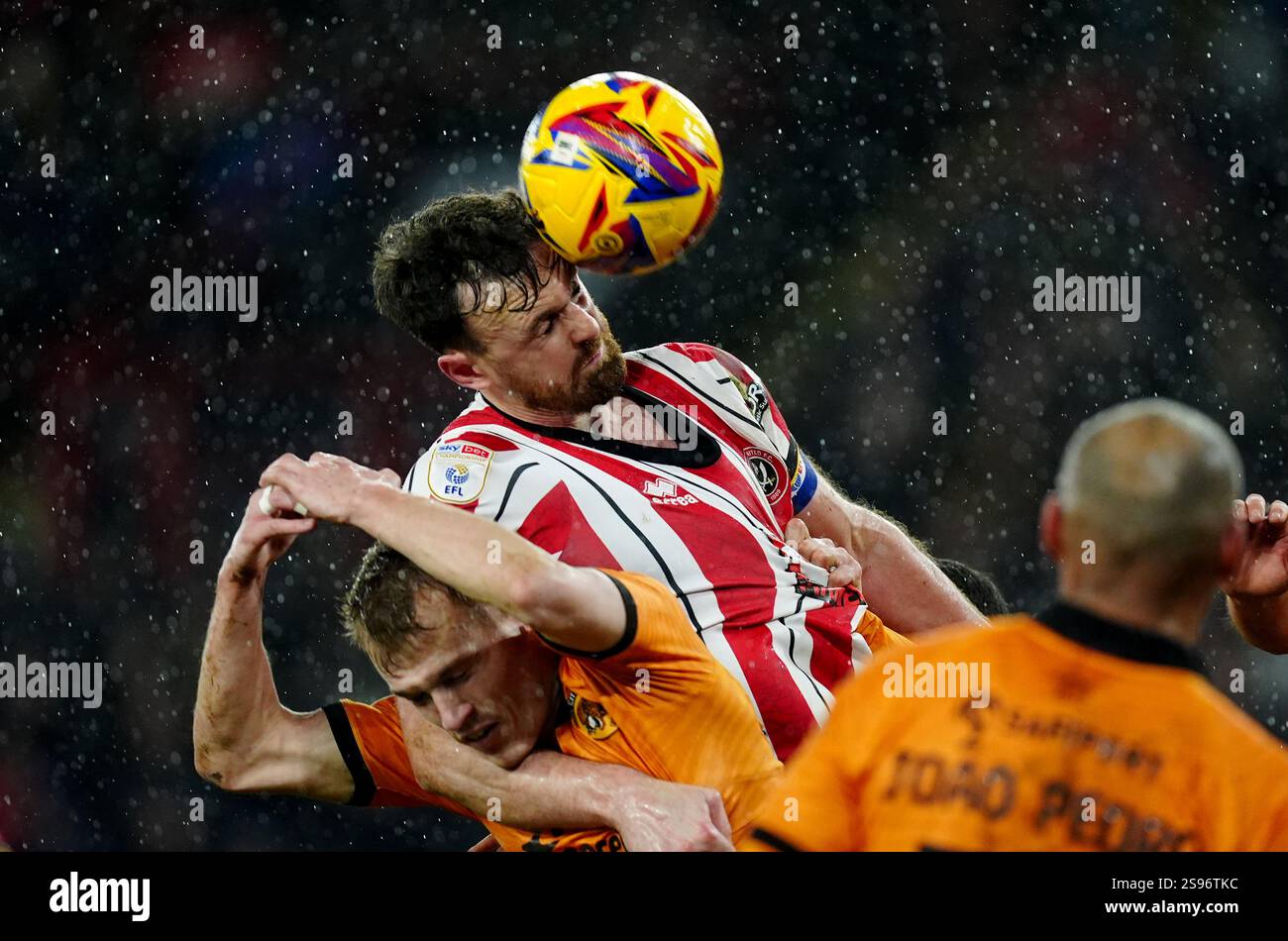 Hull City's Matty Jacob (left) and Sheffield United's Jack Robinson ...