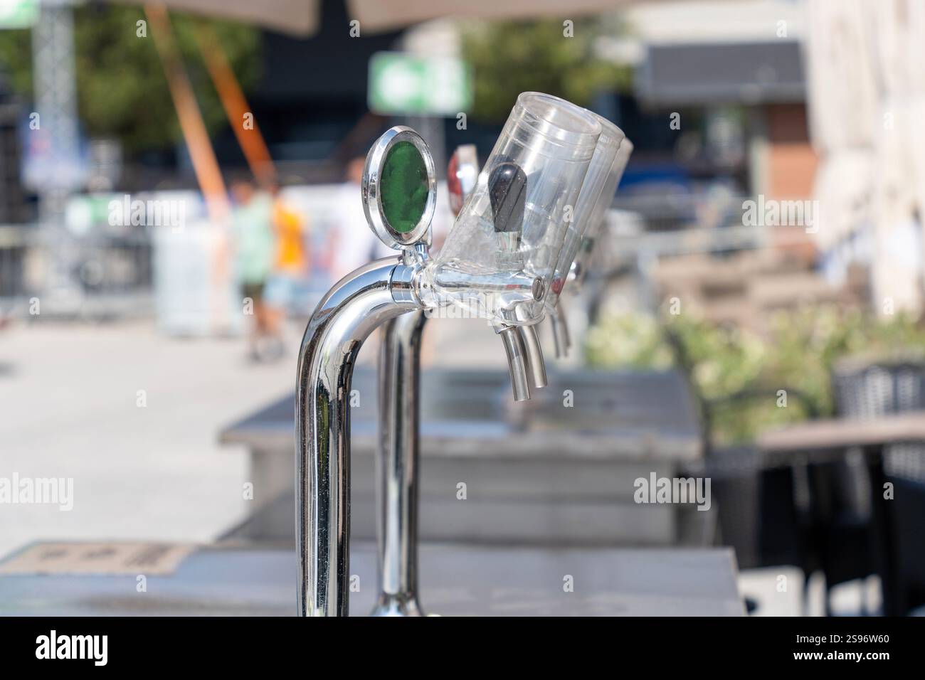 Outdoor beer taps with clear plastic cups Stock Photo - Alamy