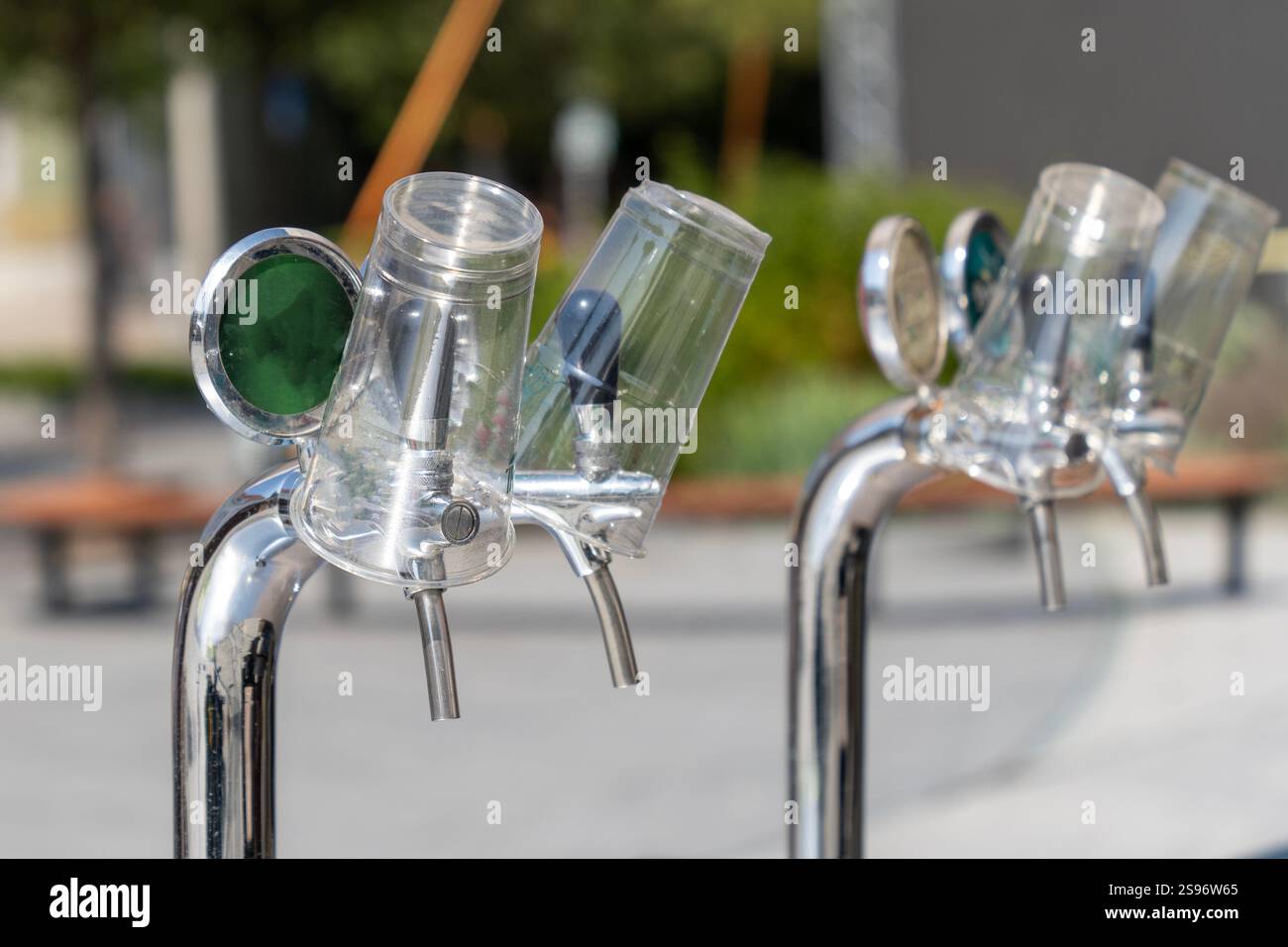 Outdoor beer taps with clear plastic cups Stock Photo - Alamy