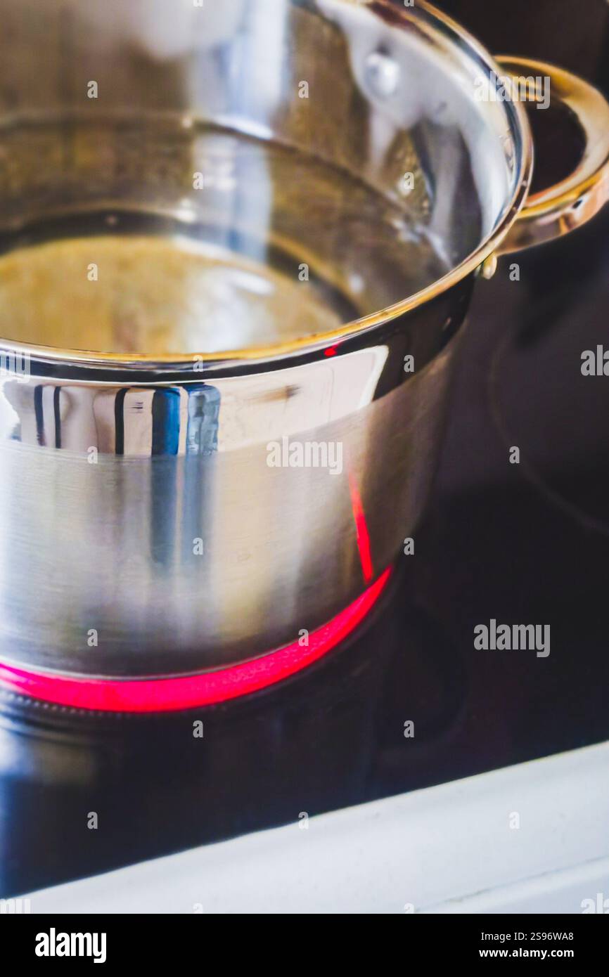 Cooking pot filled boiling water hi-res stock photography and images ...