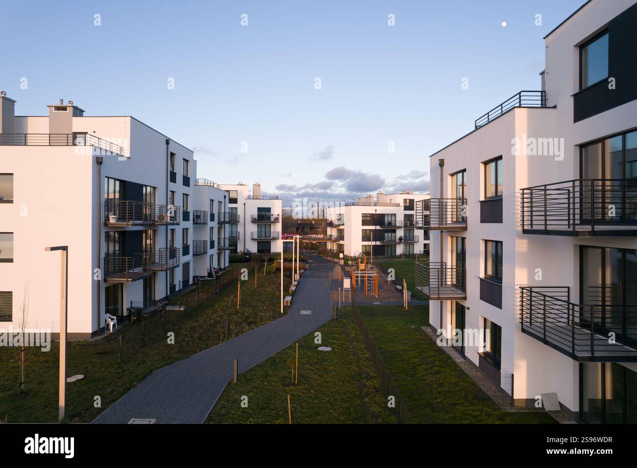 Modern Apartment Complex with Shared Outdoor Space Stock Photo - Alamy