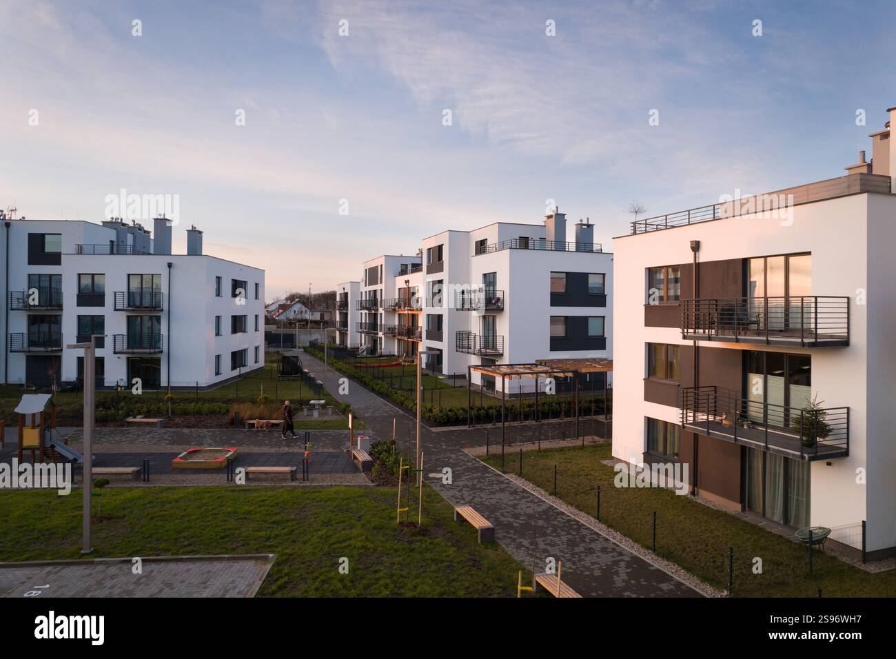 Modern Apartment Complex with Shared Outdoor Space Stock Photo - Alamy