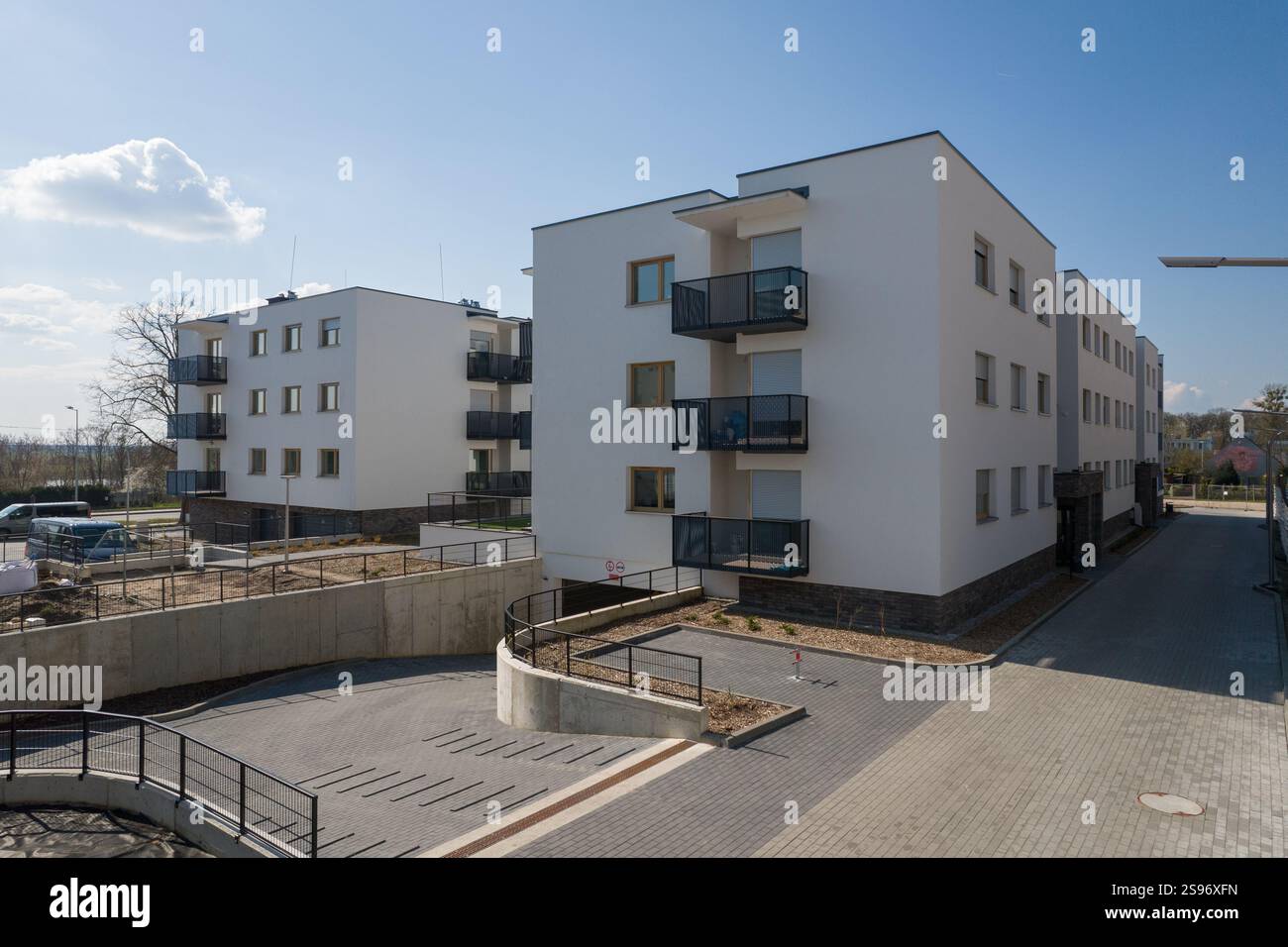 Modern White Apartment Buildings with Underground Parking Entrance ...