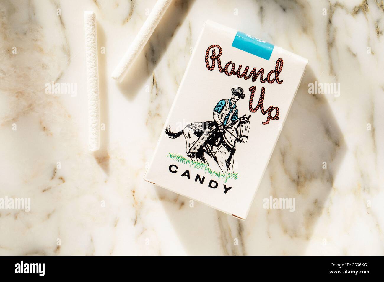 pack of Round Up Candy Cigarettes with classic cowboy illustration on ...