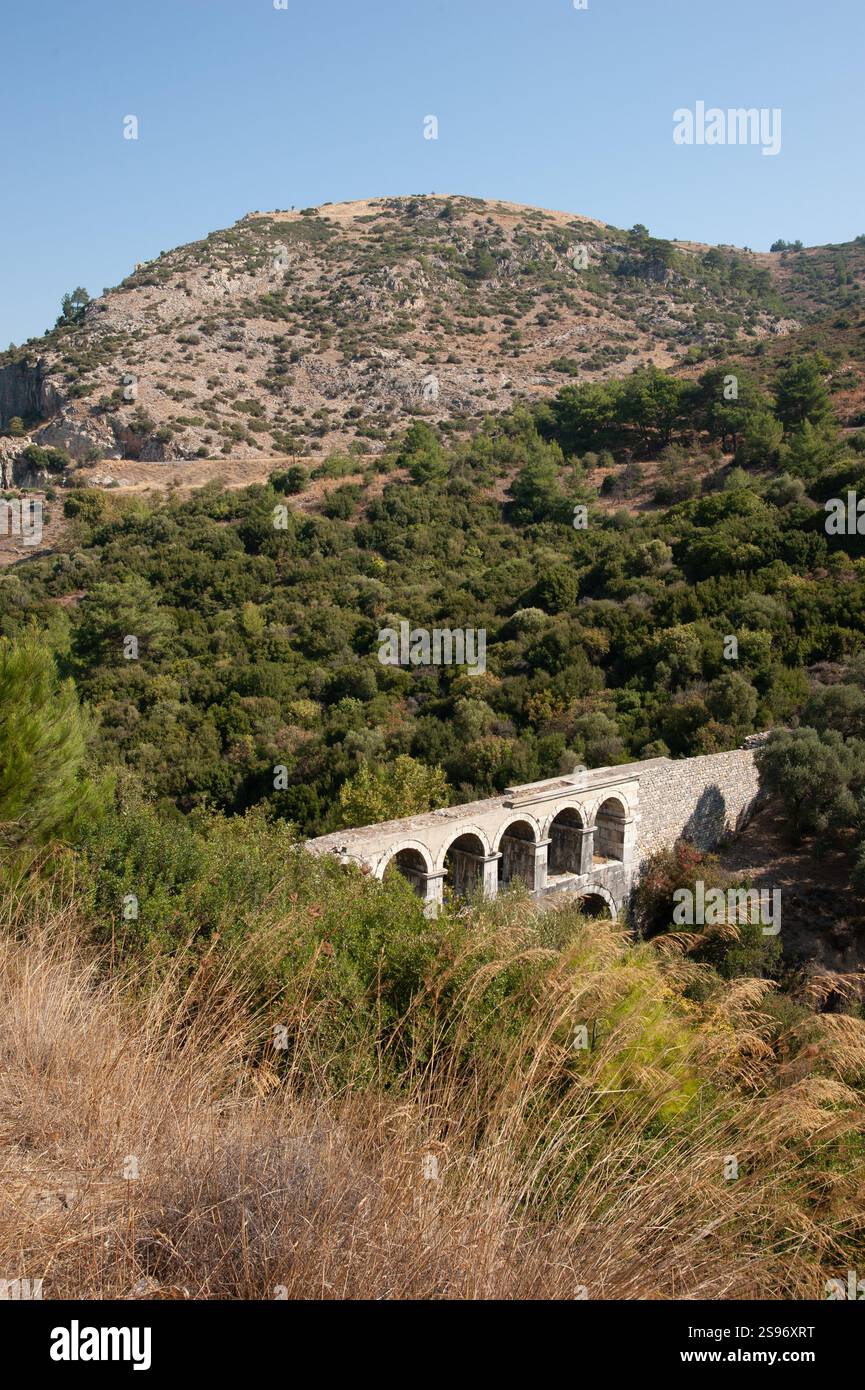 Ancient Stone Aqueduct in a Rural Hillside Stock Photo - Alamy