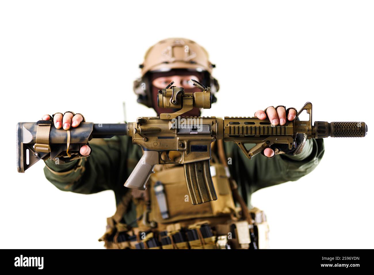 A soldier showcases a detailed tactical rifle, illustrating advanced ...