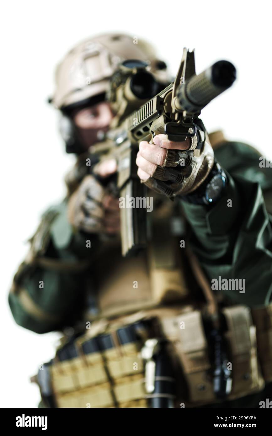 Tactical soldier in detailed military uniform aiming with precision ...