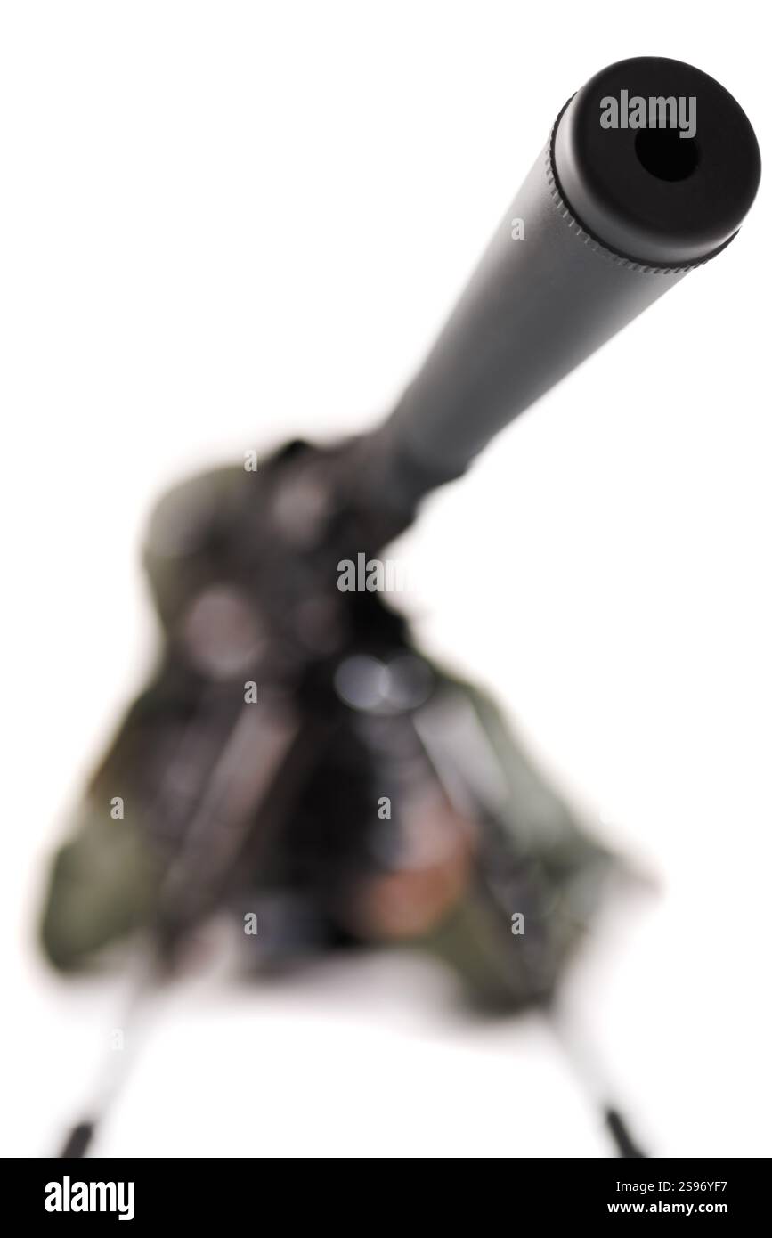 A detailed macro of a firearm barrel, emphasizing precision and focus ...