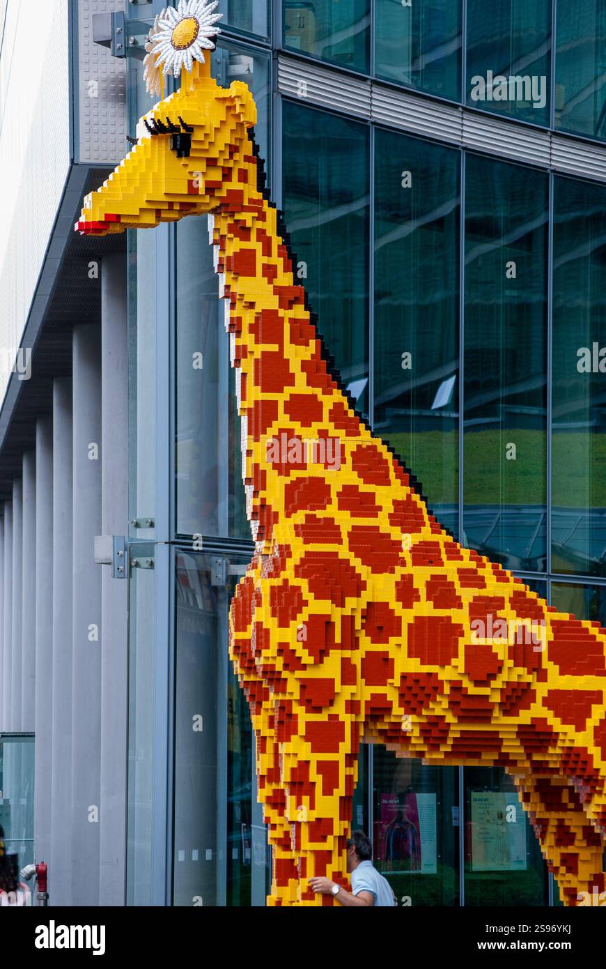Lego giraffe by modern building Stock Photo - Alamy