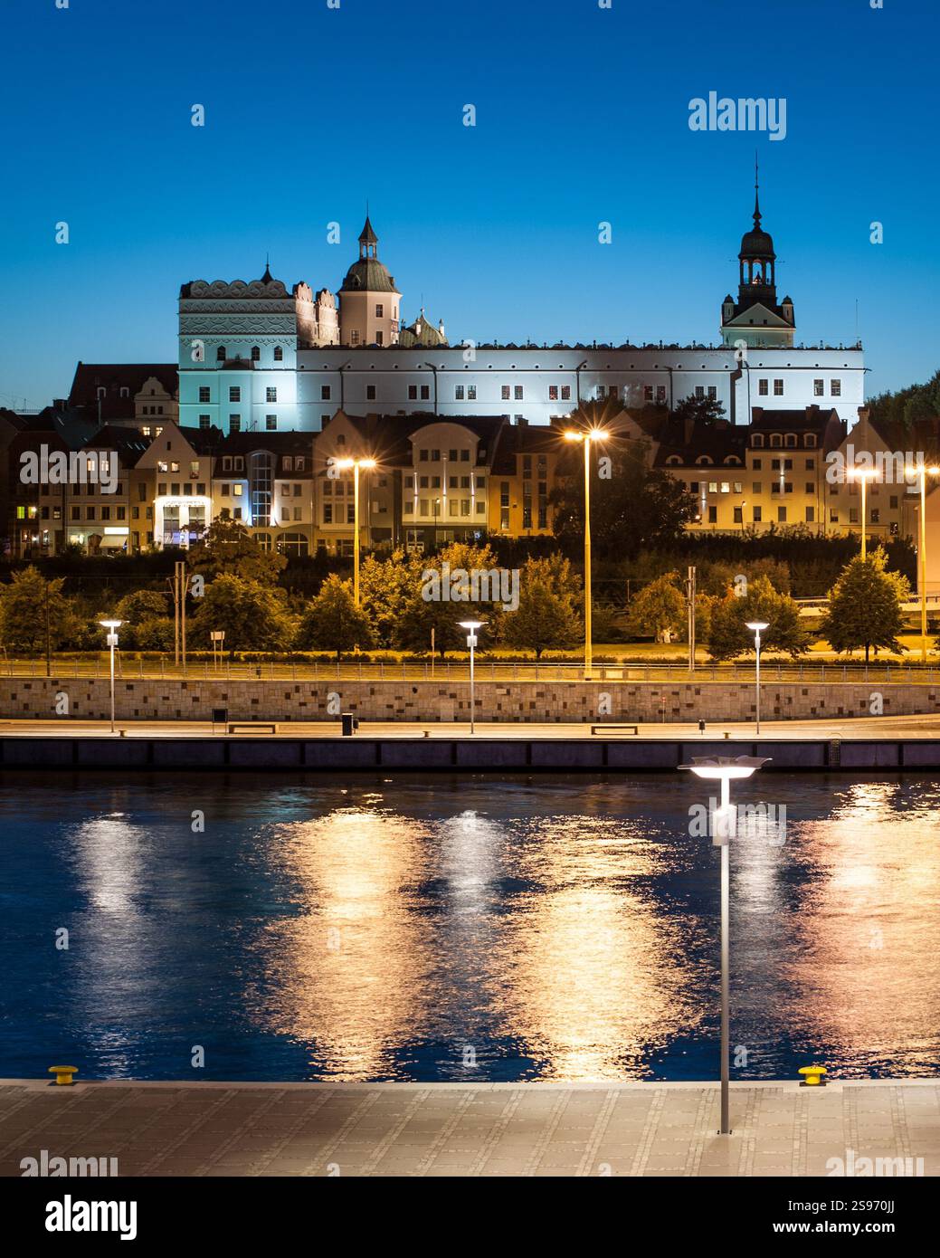 Cityscape at Night with Historic Buildings and Water Reflection Stock ...