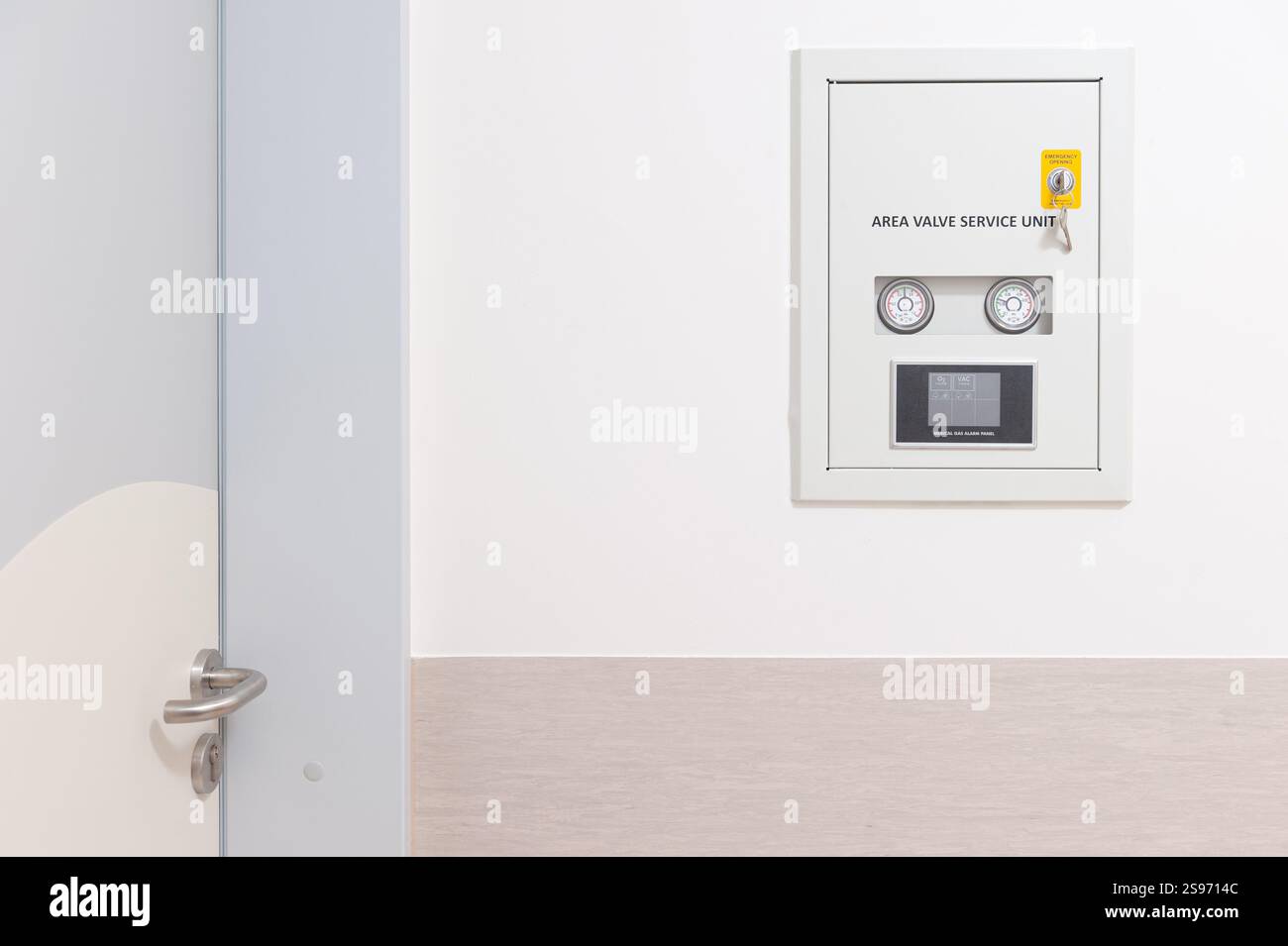 Area Valve Service Unit and Door on a White Wall Stock Photo - Alamy