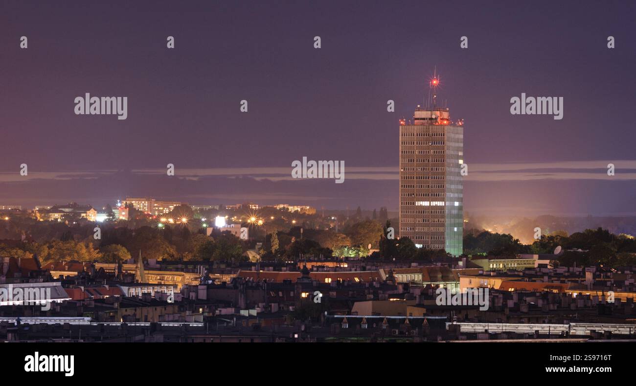 City Skyline at Night with Illuminated High-Rise Building Stock Photo ...
